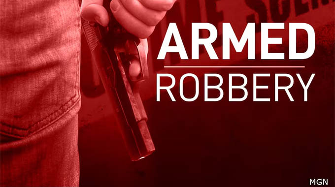 PHONE GIVES AWAY ARMED ROBBERS IN US$120K CASE - herald
