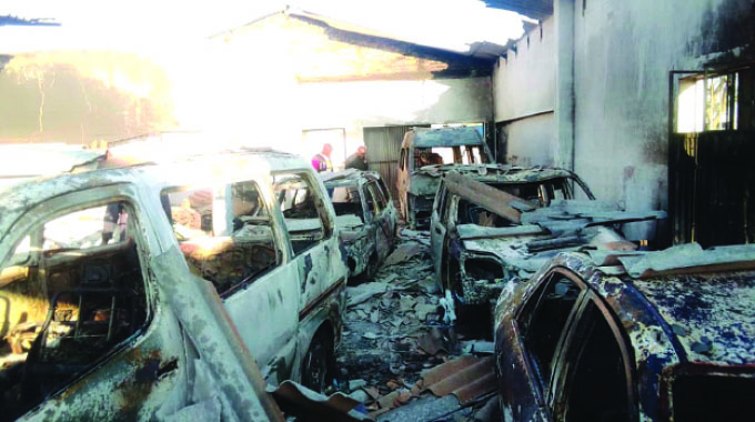 15 cars destroyed by fire at garage - herald