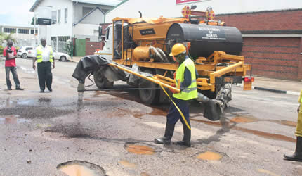 Govt acquires pothole patching equipment - herald