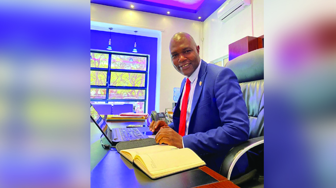 Dr Gerald Zhou, banker with three decades of experience - herald